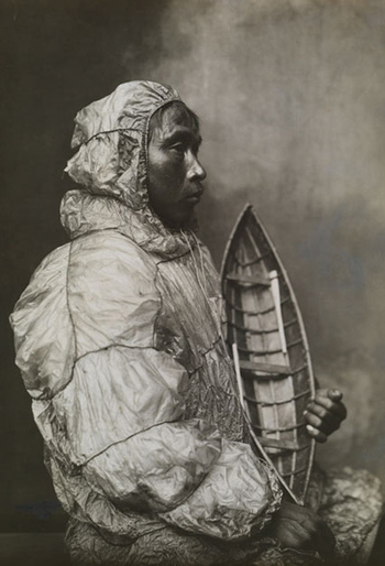 harvestheart: Holding a model umiak, or canoe, an Inuit in… | THE DARK ...