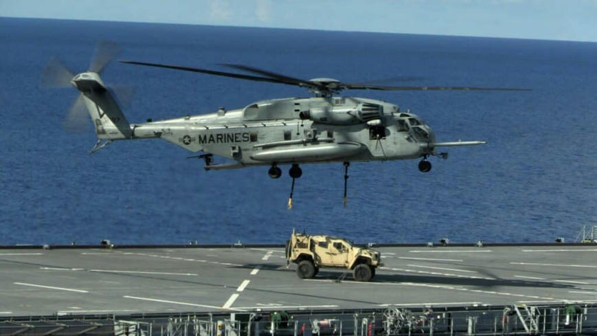 USMC Conducts JLTV Shore-to-Ship Heavy Lift | D...